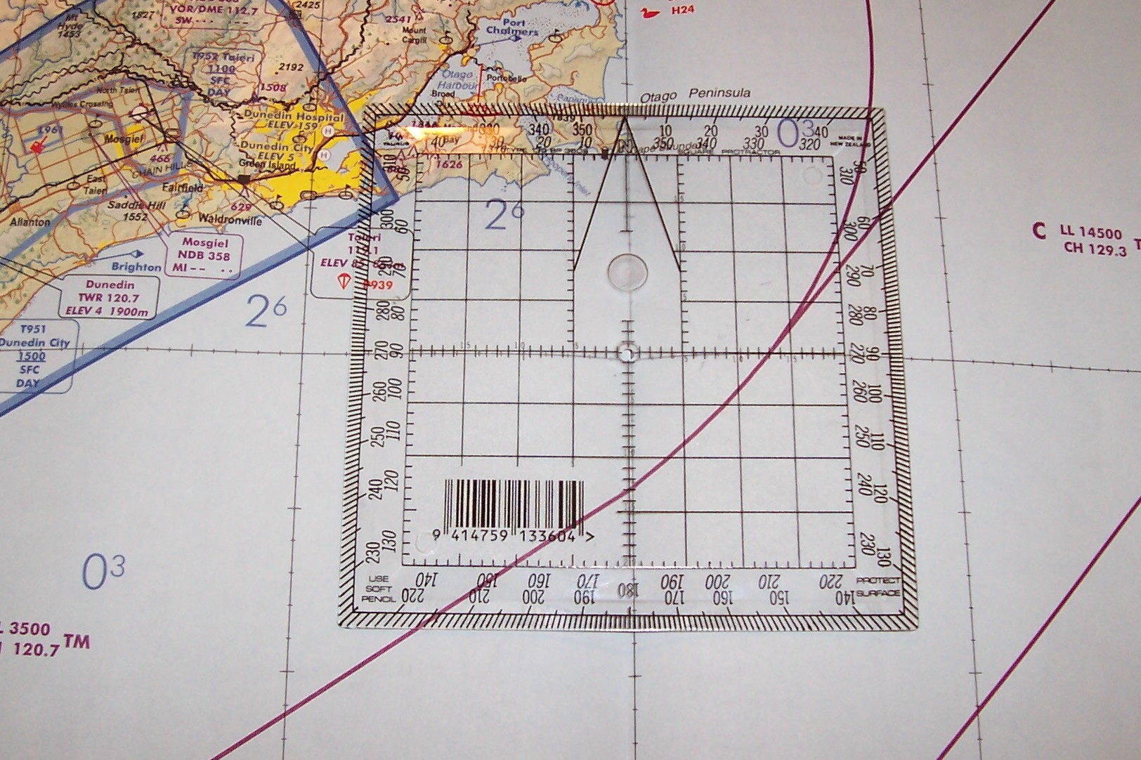 Navigation protractor in clear see through plastic.